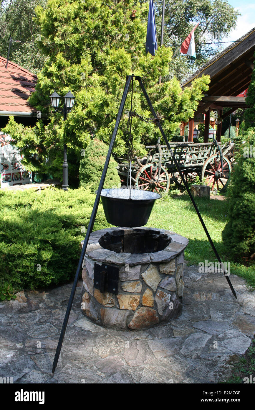 Cauldron in the yard Stock Photo - Alamy
