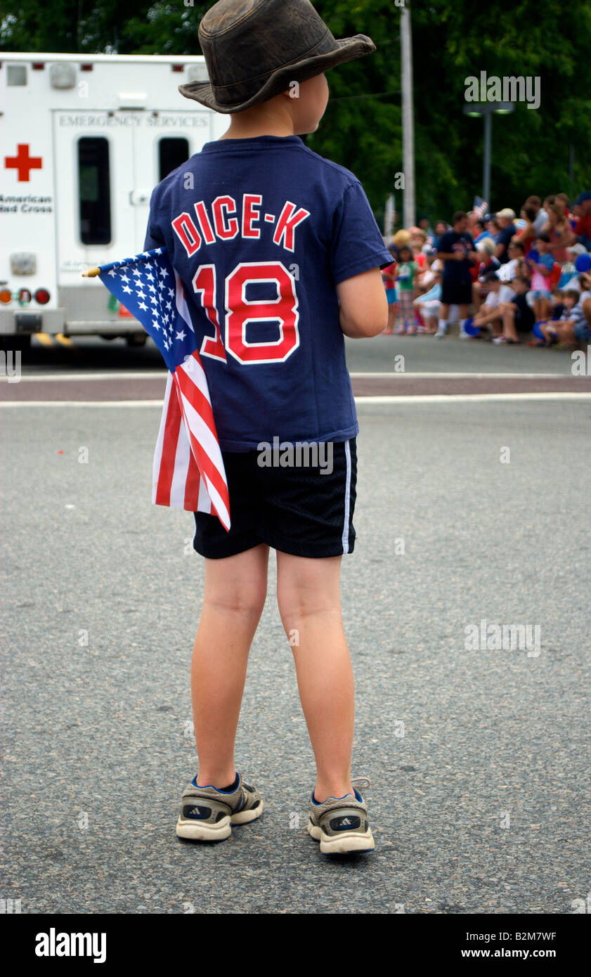 boy standing at the 4th of july parade Stock Photo - Alamy