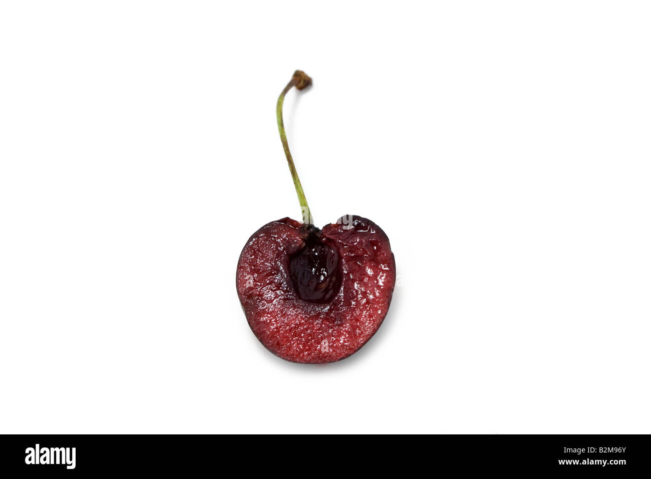 Cut of Cherry fruit over white Stock Photo - Alamy