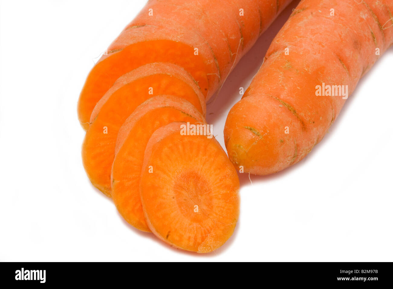 Sliced Carrot over the white Stock Photo - Alamy