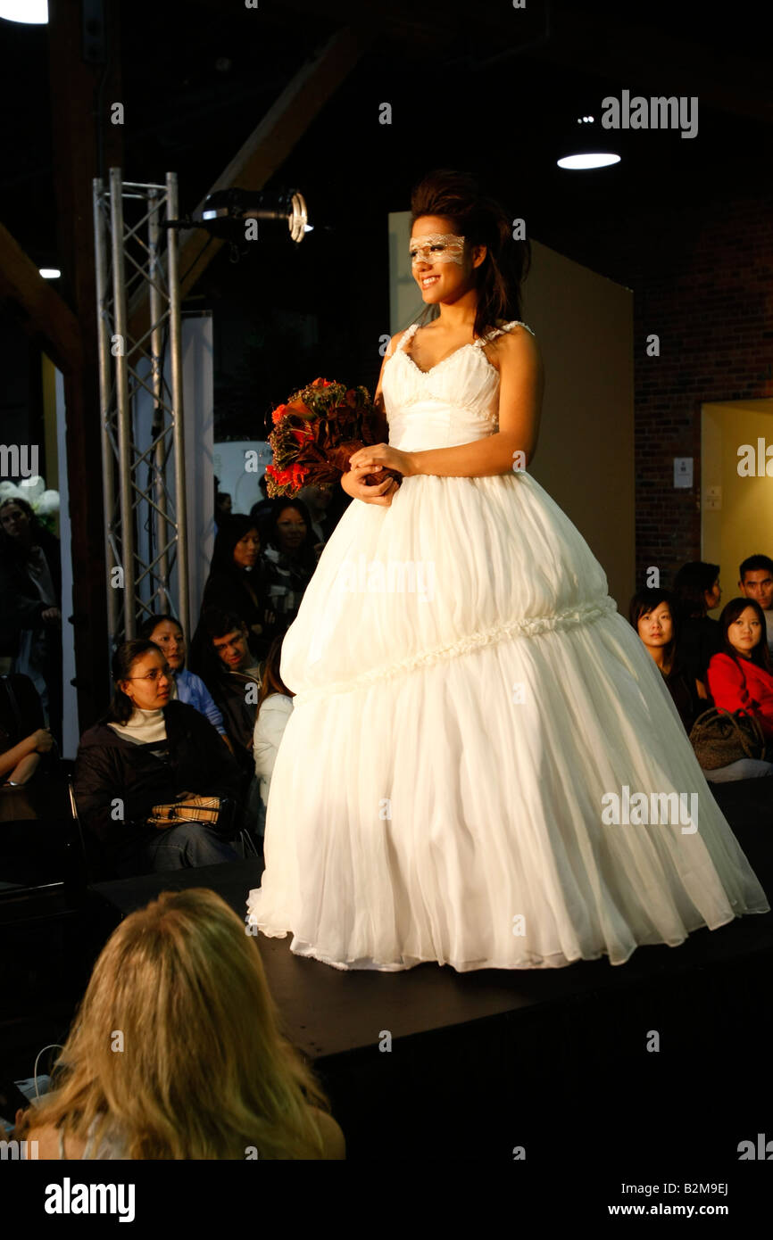 female modeling at a fashion show for wedding dresses Stock Photo - Alamy