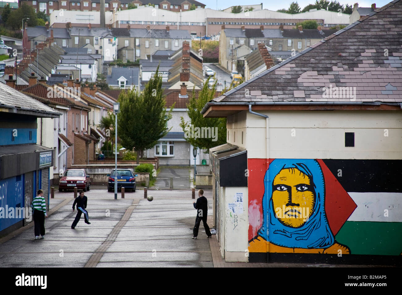 Boys play football on the Bogside Estate, Derry, Northern Ireland Stock ...