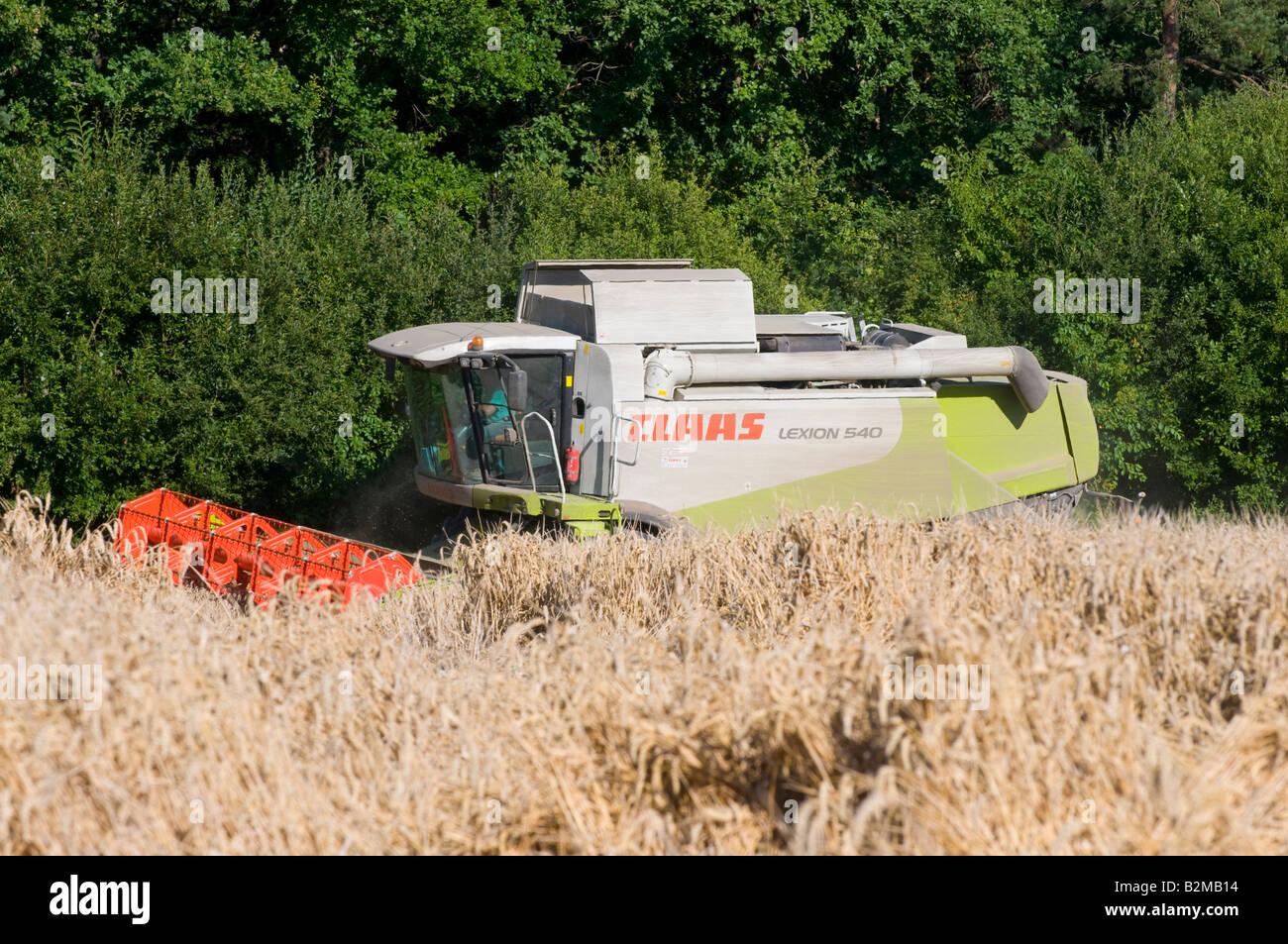 "Claas Lexion 540" combine harvester at work, sud-Touraine, France ...