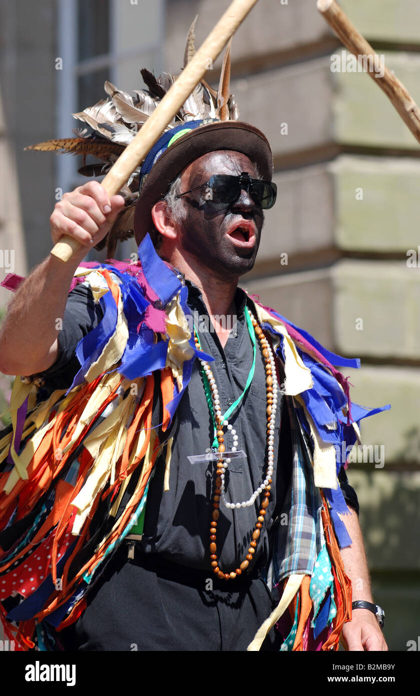 Black faced mummer dancing at Warwick Folk Festival 2008 UK Stock Photo ...