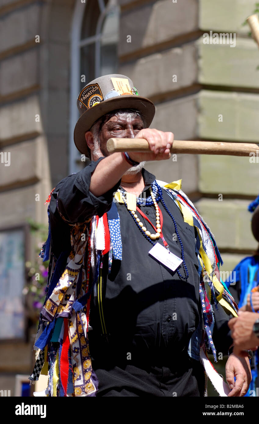 Black faced mummer dancing at Warwick Folk Festival 2008 UK Stock Photo ...