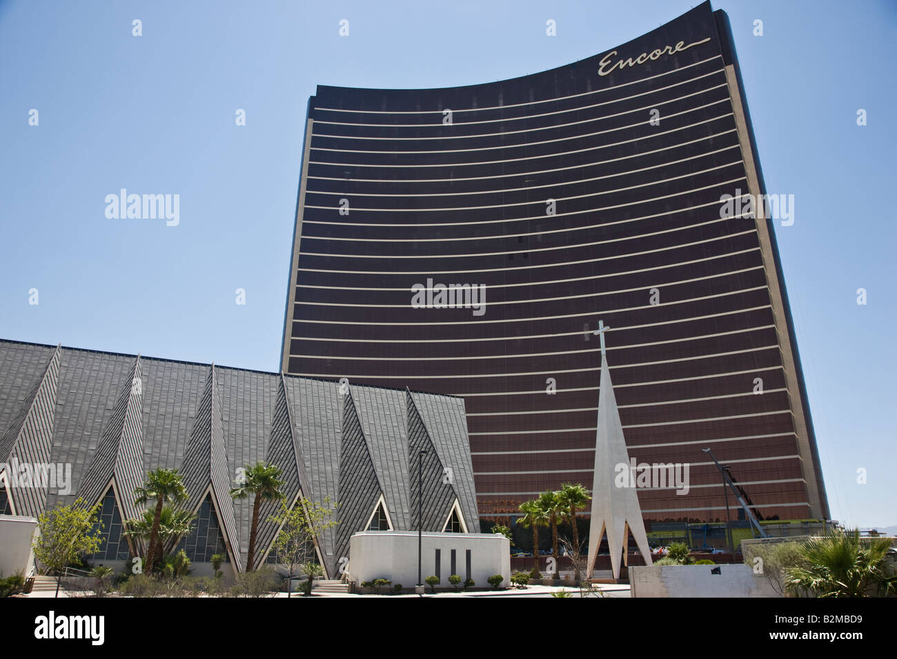Catholic Church framed against newly constructed Encore Resort, Hotel ...