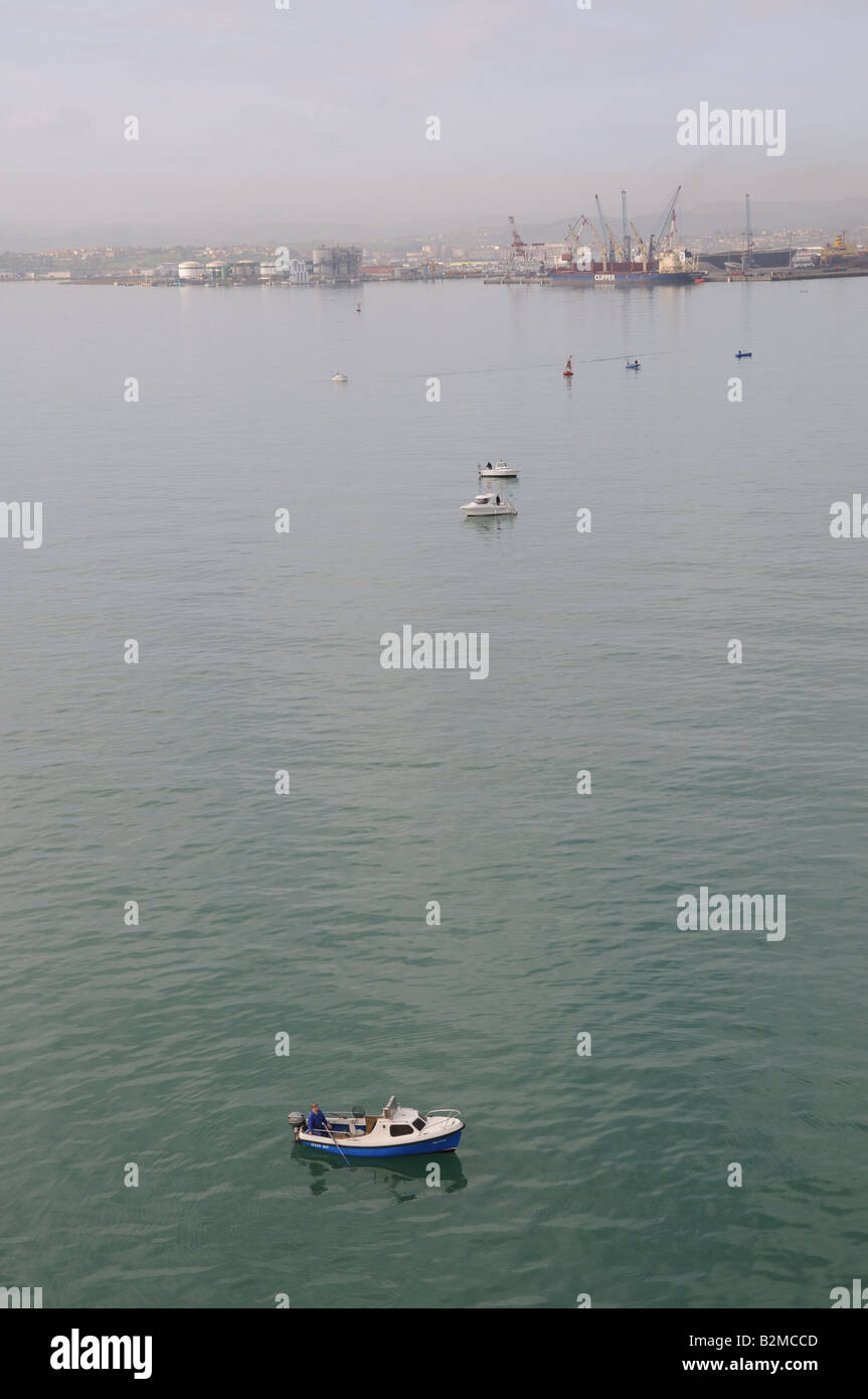 Santander port northern Spain harbour with cranes derricks small boats ...