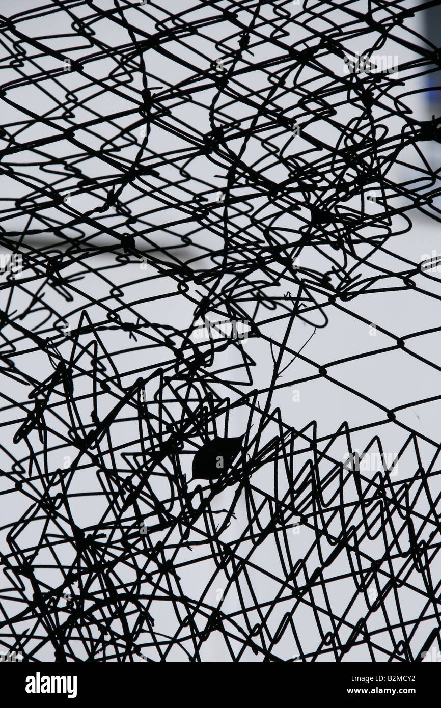 silhouette pattern overlap tangled wire fence Stock Photo - Alamy