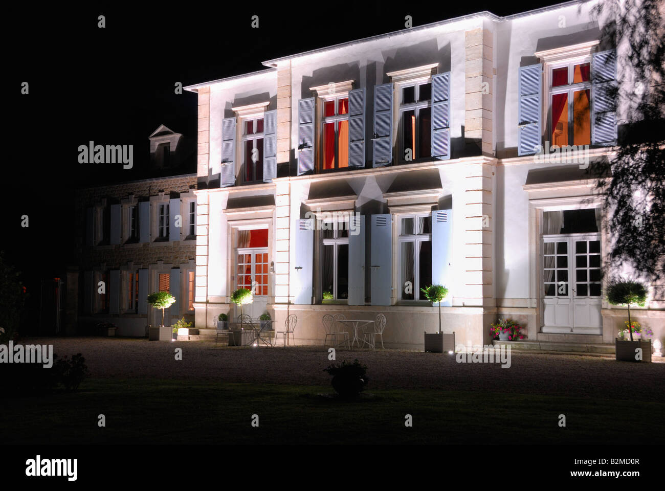 Floodlit house in northern France on a windy night Stock Photo - Alamy