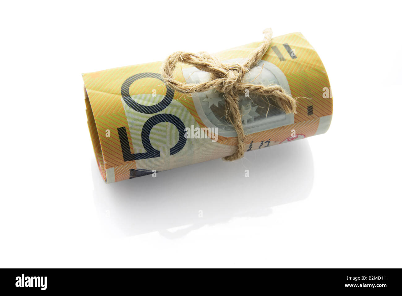 Roll of Dollar Notes Tied with String Stock Photo - Alamy