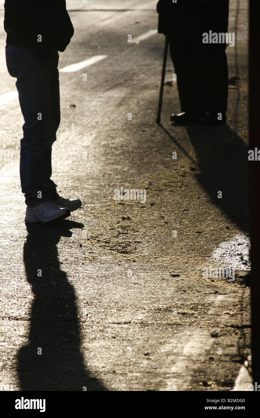 one person standing in street in city town Stock Photo - Alamy