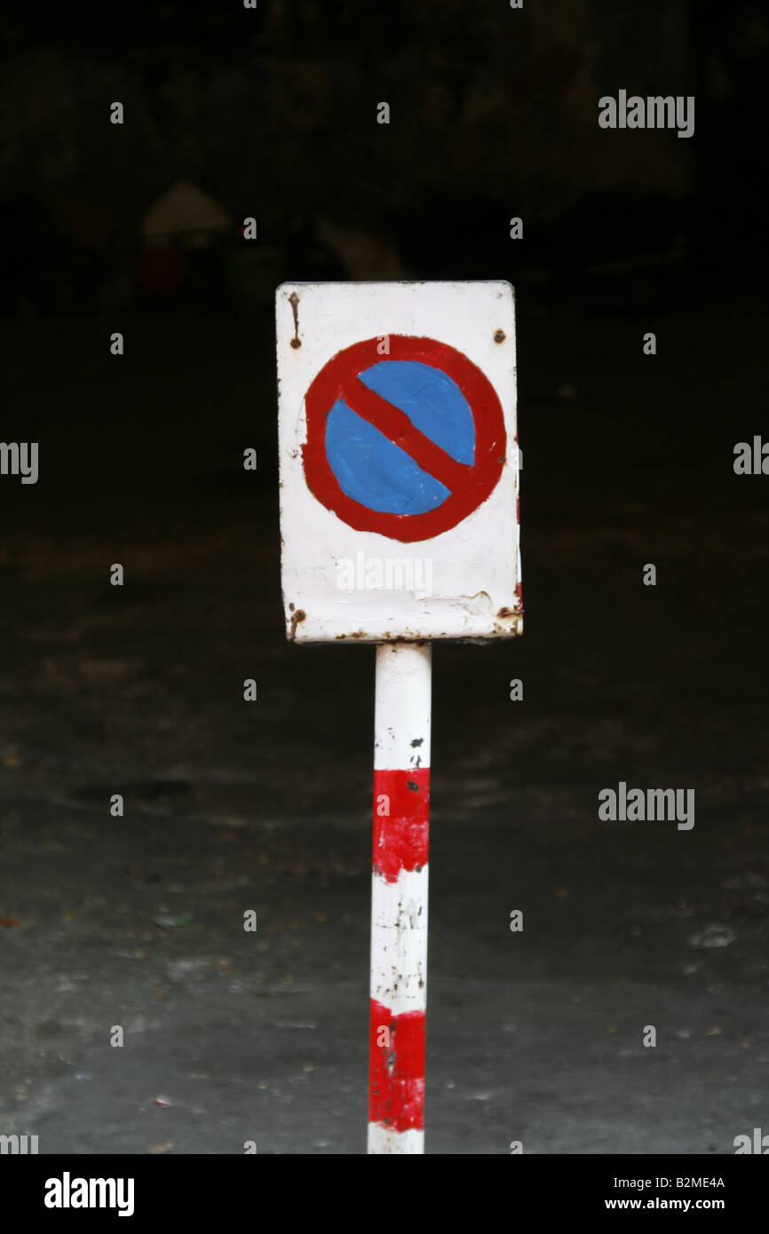 home made painted no parking sign in city street Stock Photo - Alamy