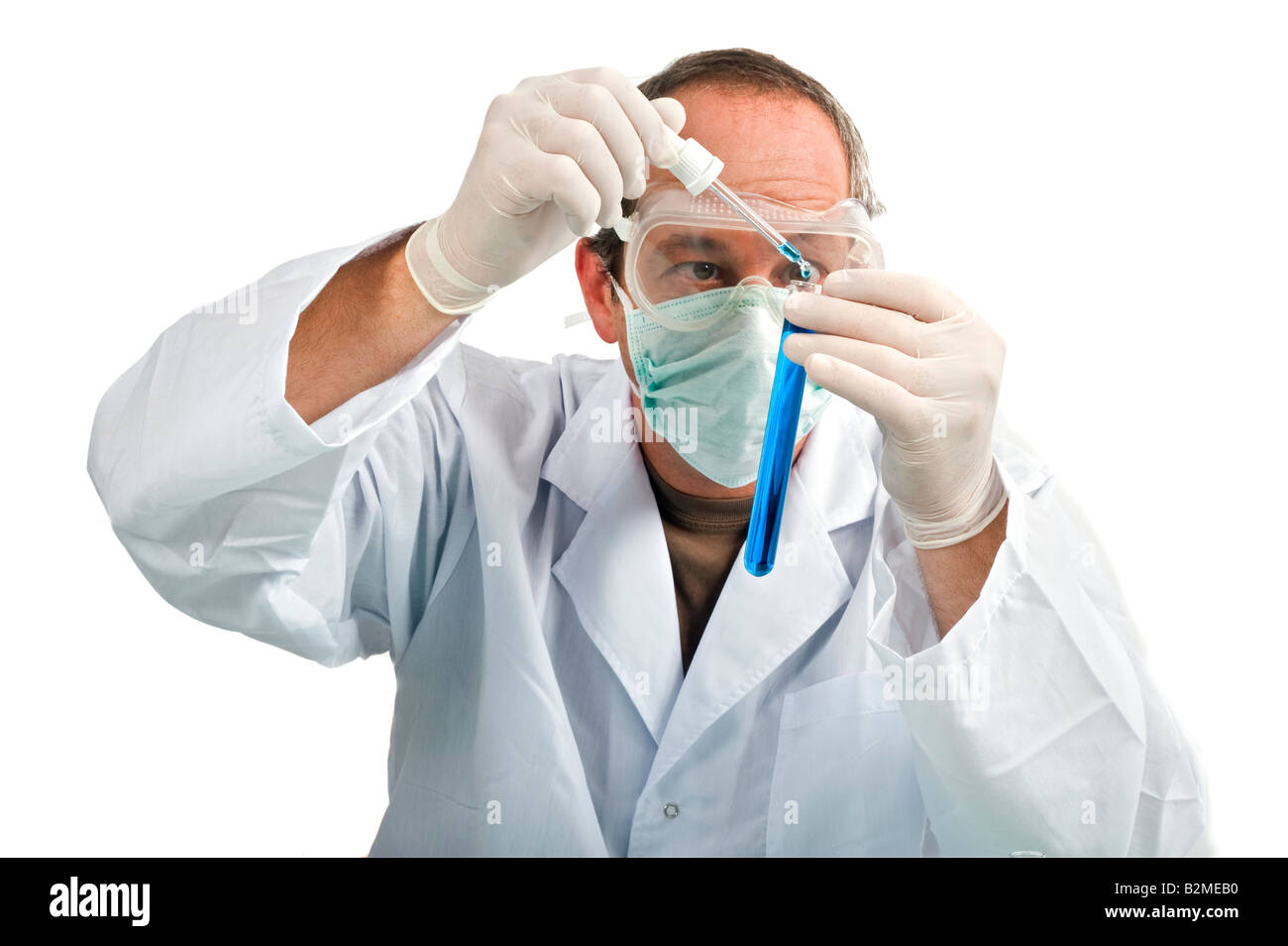 scientist in laboratory holiding pipette and test tube with blue liquid ...
