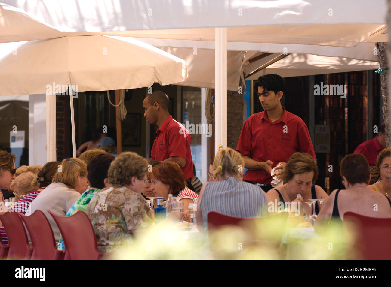 Costa Blanca Spain Benidorm a restaurant and waiters Stock Photo - Alamy