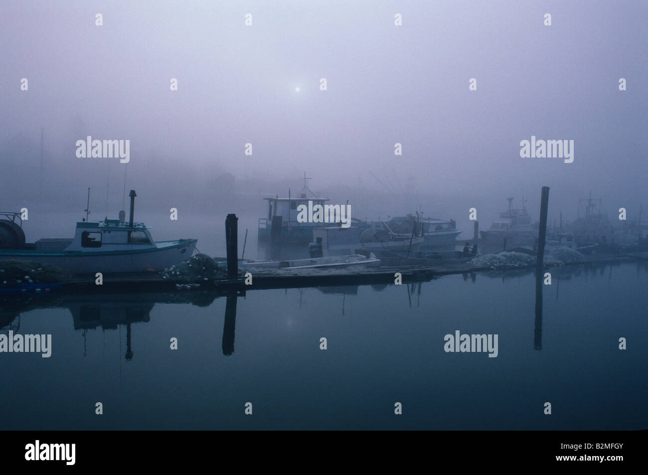 La Connor with marinas and downtown along the Swinomish channel in fog ...