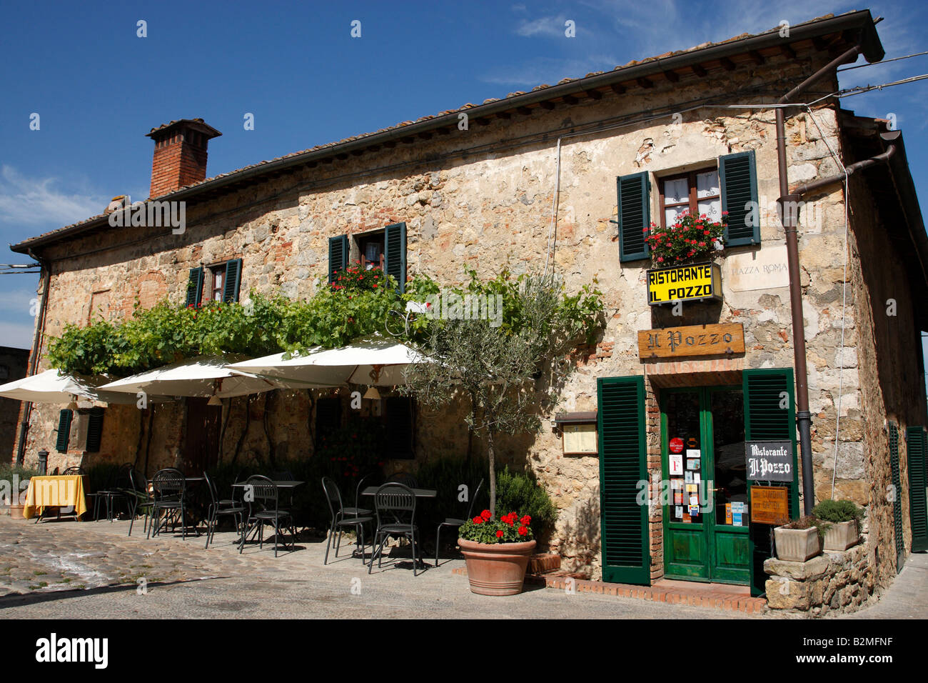 view of the restaurant il pozzo piazza roma monteriggioni tuscany italy ...