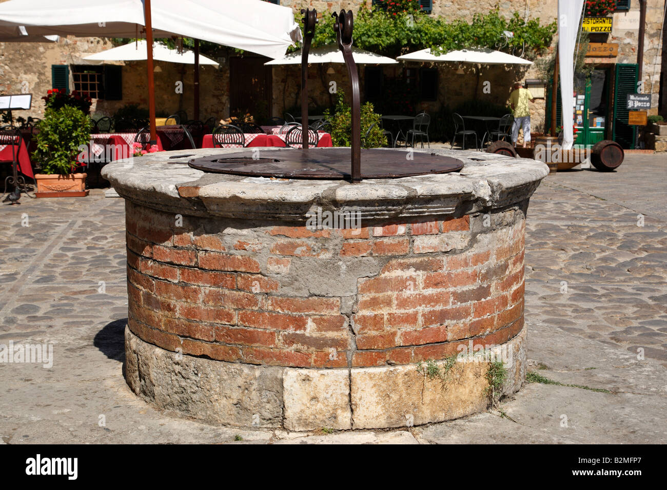 the towns water well in piazza roma monteriggioni tuscany italy europe ...