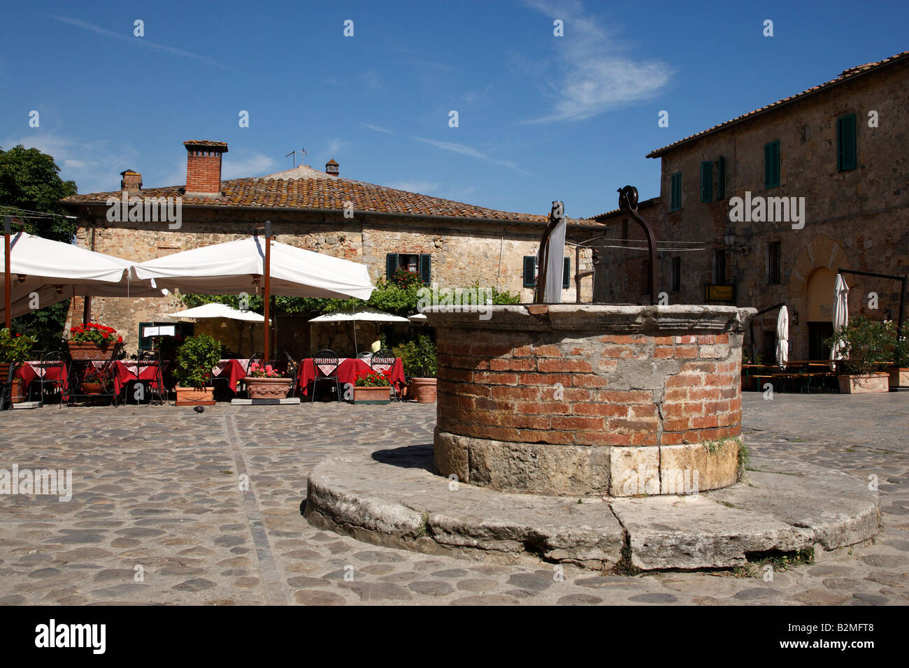 the towns water well in piazza roma monteriggioni tuscany italy europe ...