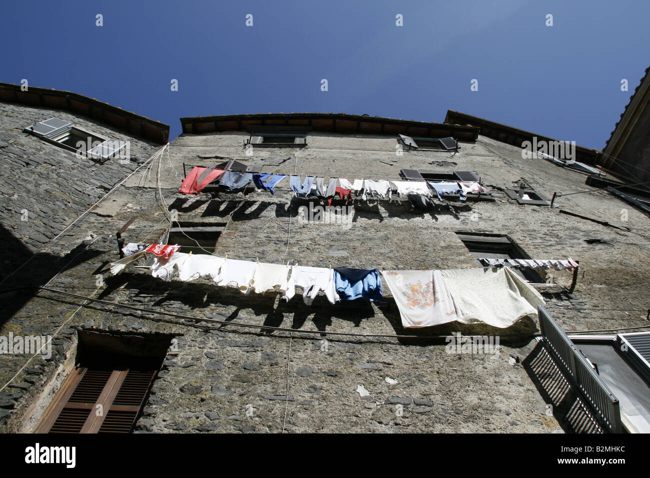 washing line outside houses in bracciano, italy Stock Photo - Alamy