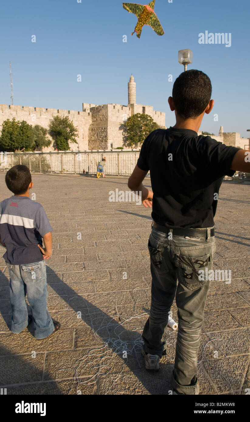 Israel Jerusalem Old city Jaffa Gate Two kids playing with a kite in ...