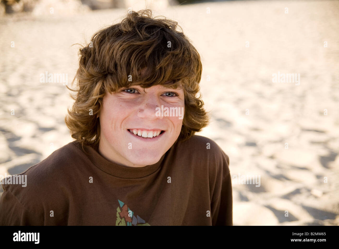 Portrait of smiling boy on the beach Stock Photo - Alamy