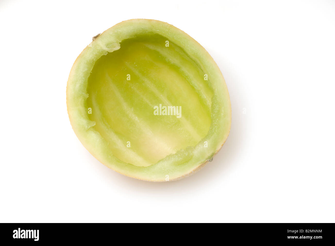 Halved Galia melon eaten and scooped out Stock Photo - Alamy