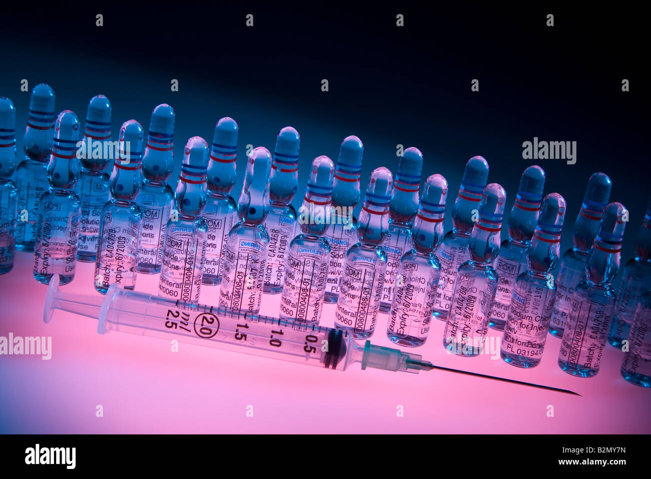 Syringe and water phial used in IVF treatment Stock Photo - Alamy