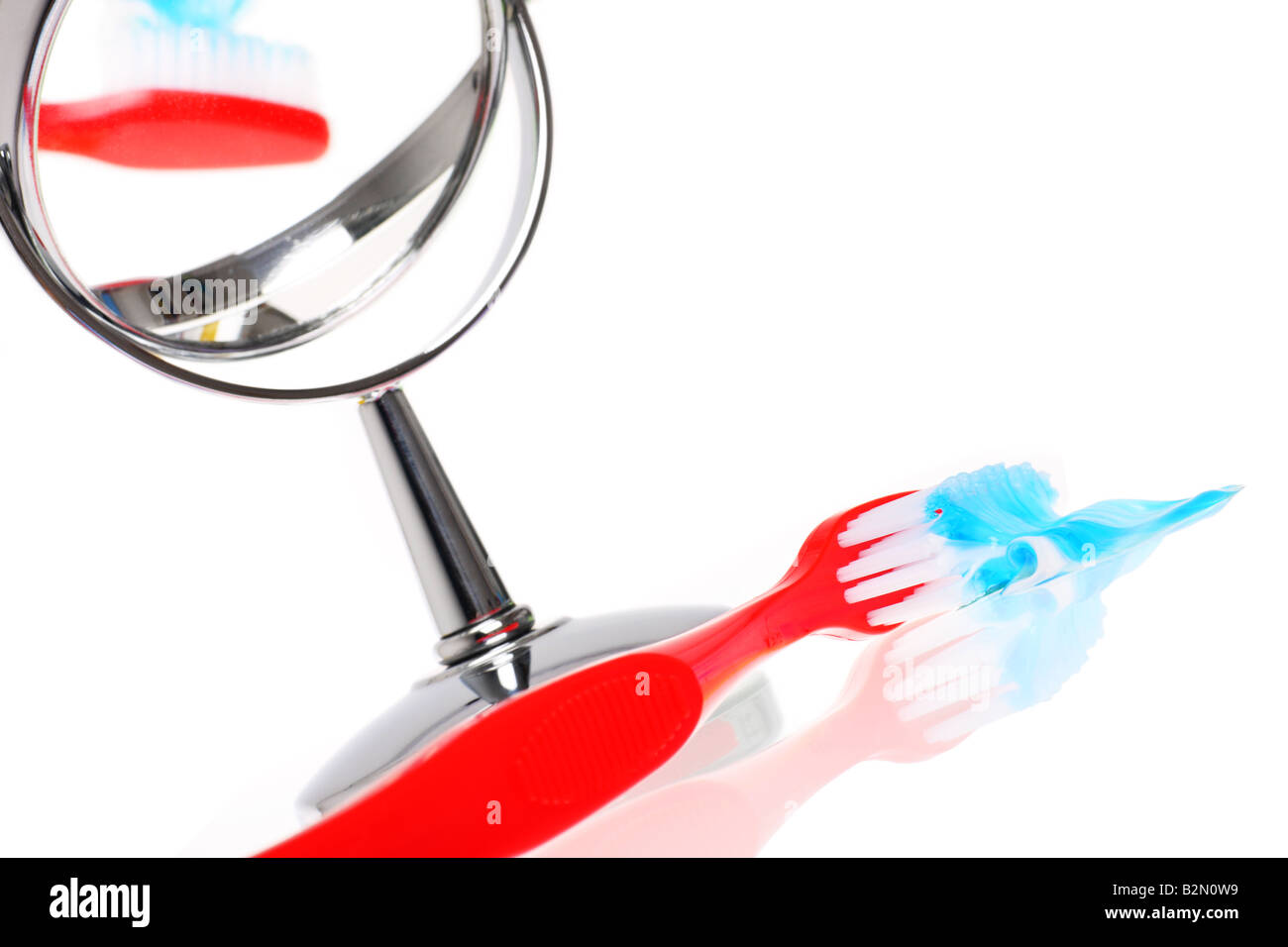 toothbrush and paste focus on toothpaste and brush head Stock Photo - Alamy