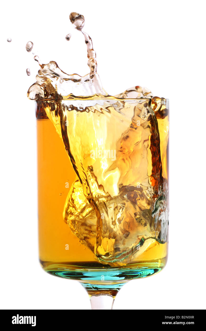 white grape juice with a splash of ice Stock Photo - Alamy