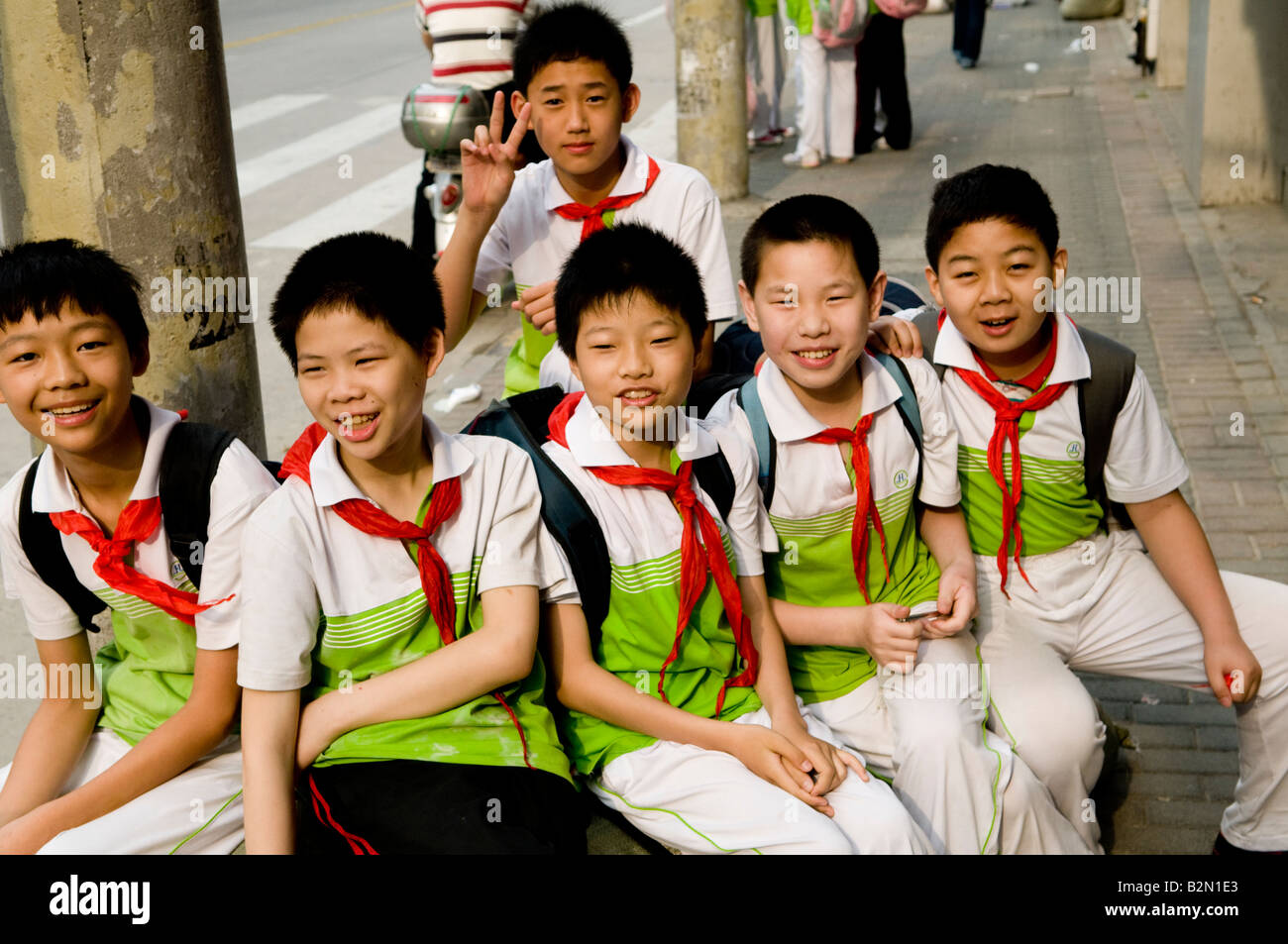 School children smile to the camera in downtown Shanghai,China Stock ...
