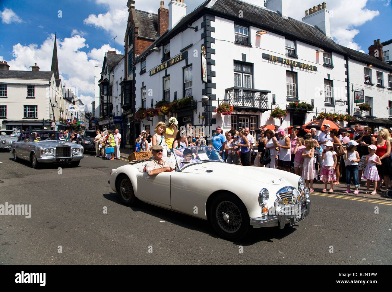 Vintage cars in monmouth carnival procession, wales Stock Photo - Alamy