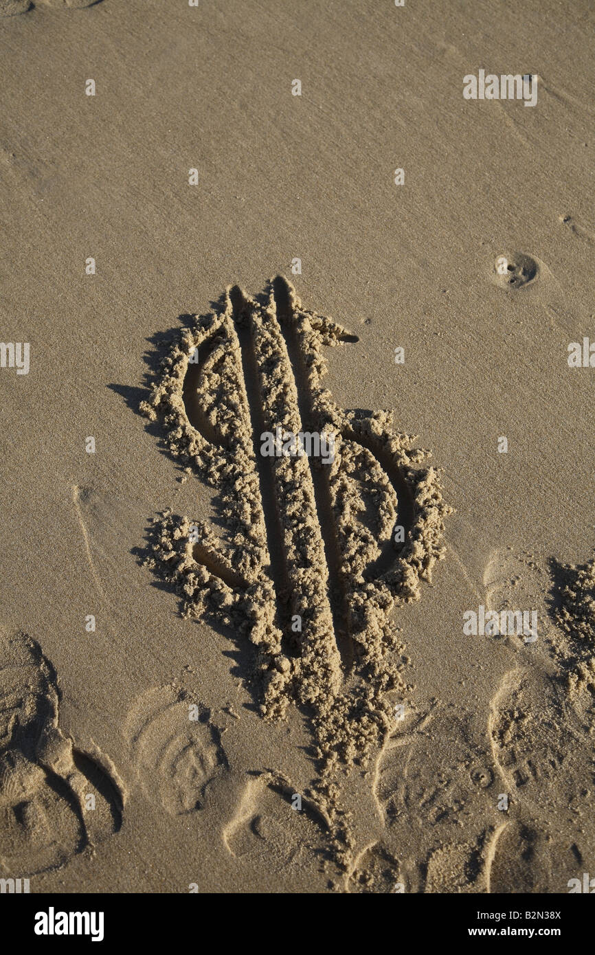 dollar sign in sand Stock Photo - Alamy