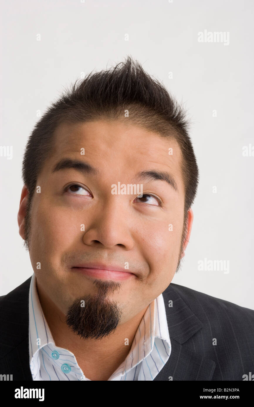 Close-up of a businessman grinning Stock Photo - Alamy