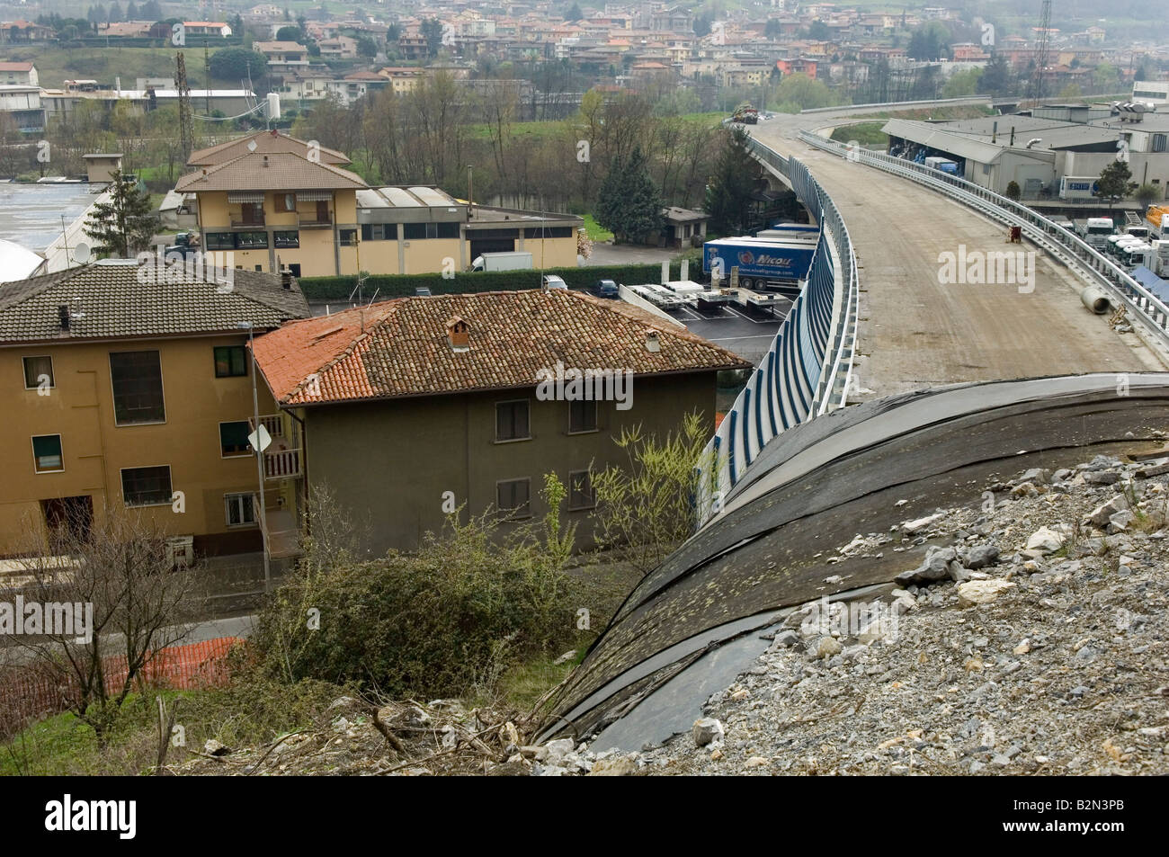 building highway and houses, albino, Italy Stock Photo - Alamy