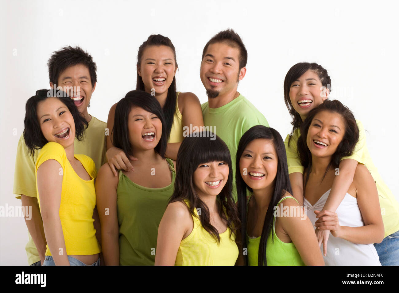 Portrait of a group of friends smiling Stock Photo - Alamy