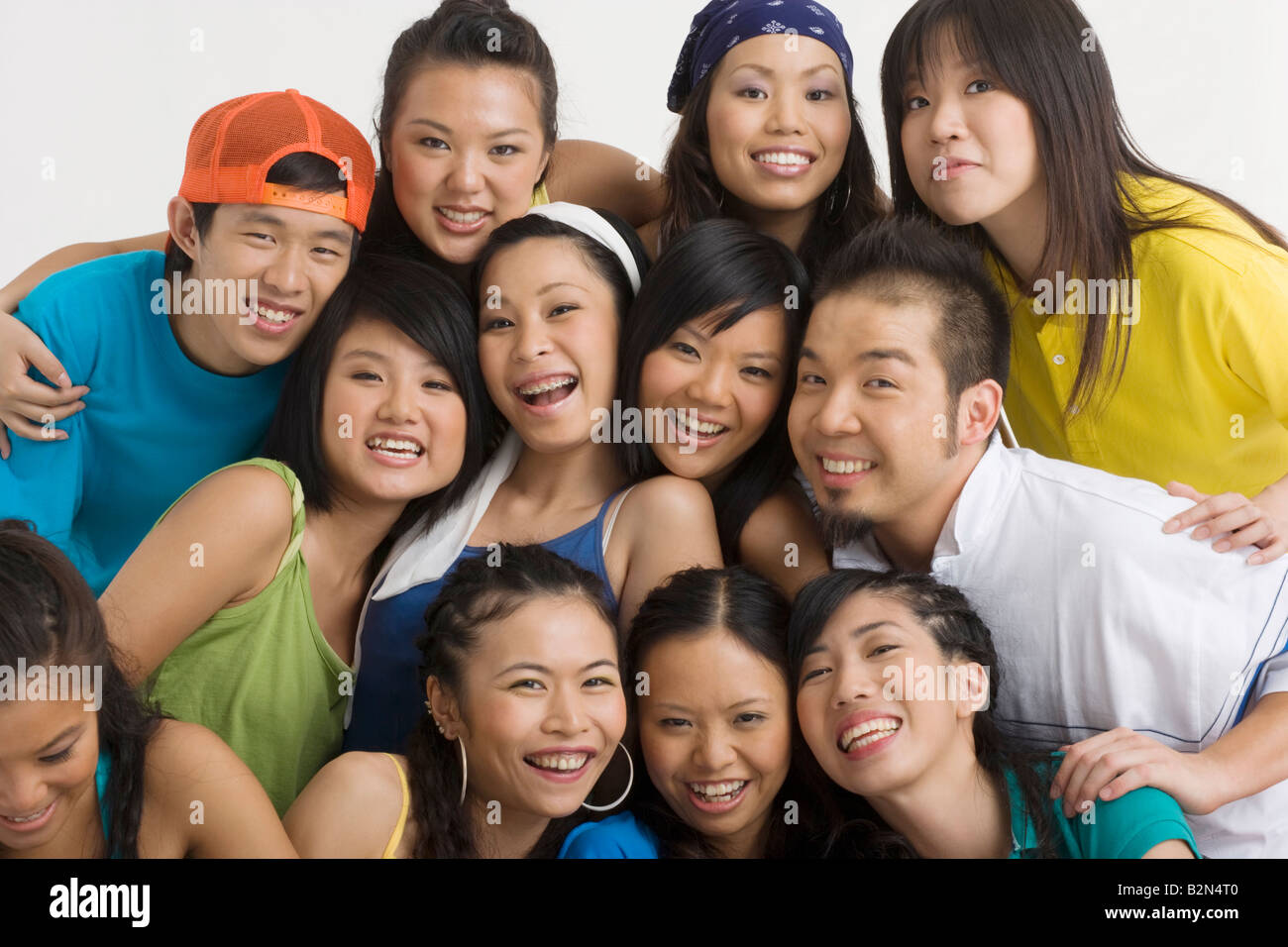 Portrait of a group of friends smiling Stock Photo - Alamy