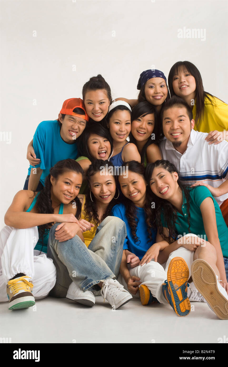 Portrait of a group of friends smiling Stock Photo - Alamy