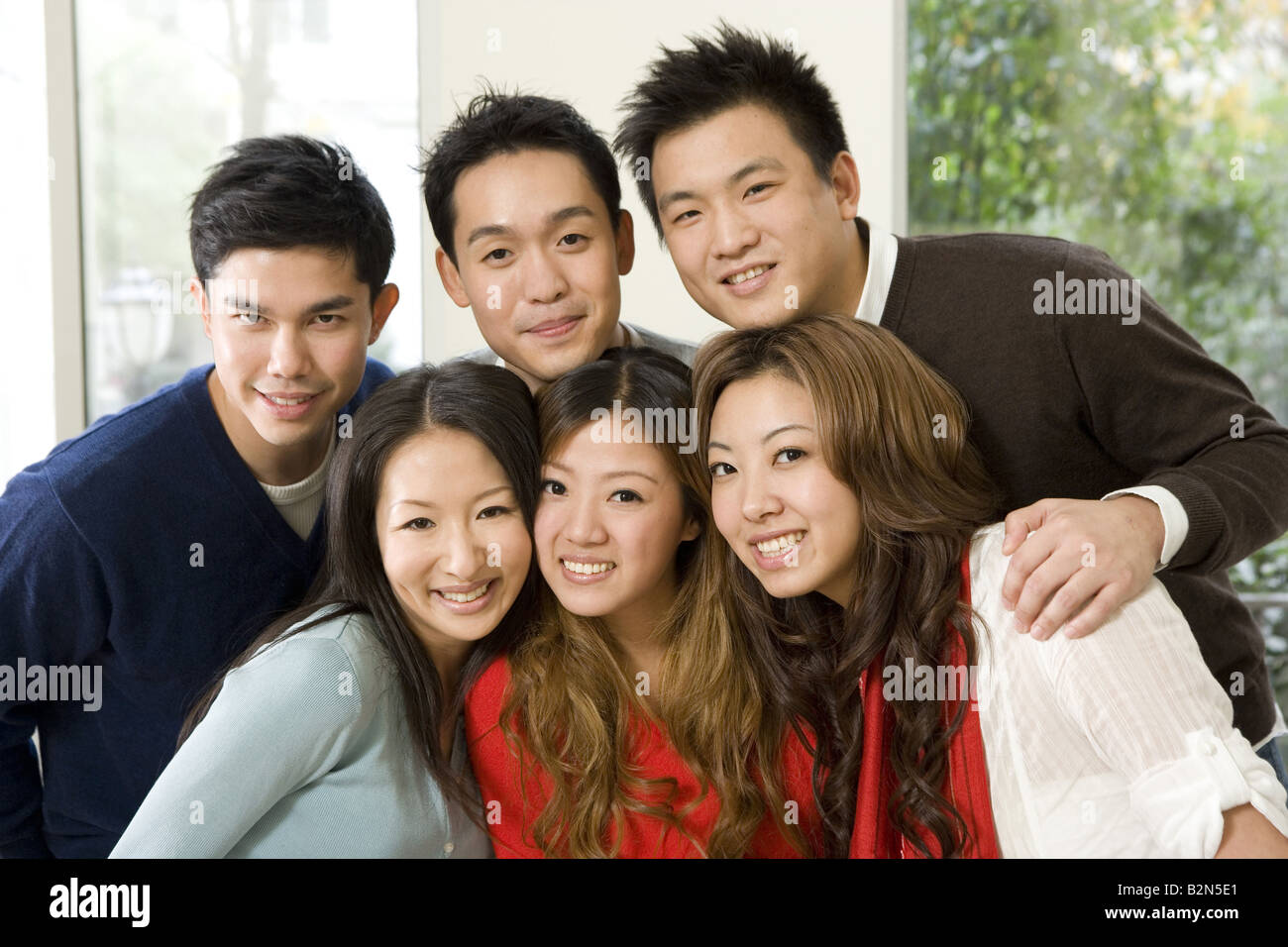 Portrait of friends smiling Stock Photo - Alamy