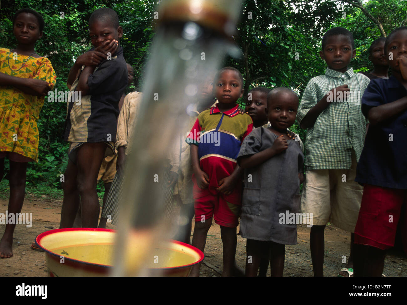 children collecting water africa Stock Photo - Alamy