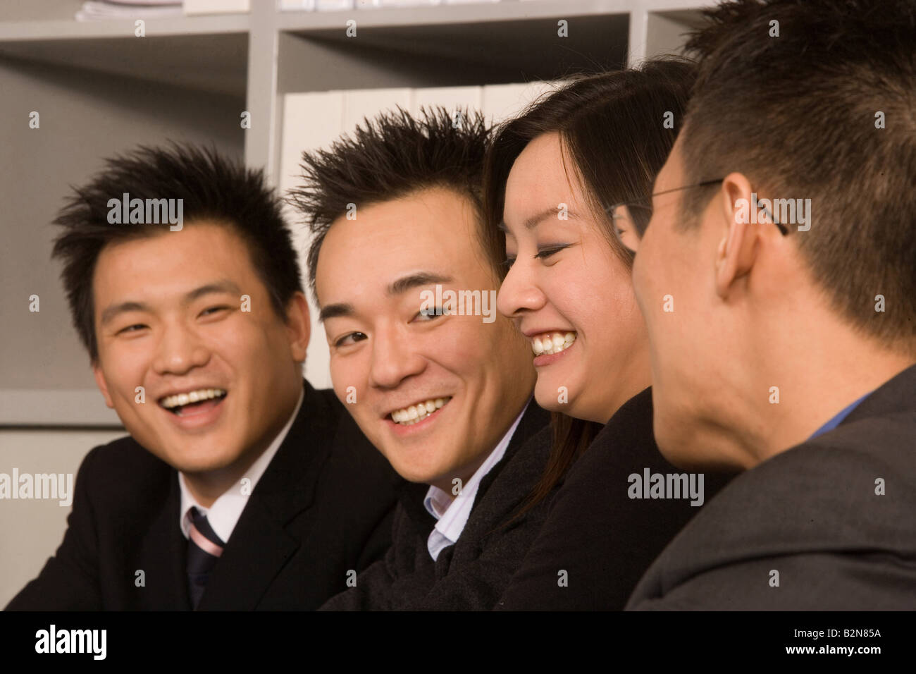 Smiling chinese businessmen in hi-res stock photography and images - Alamy
