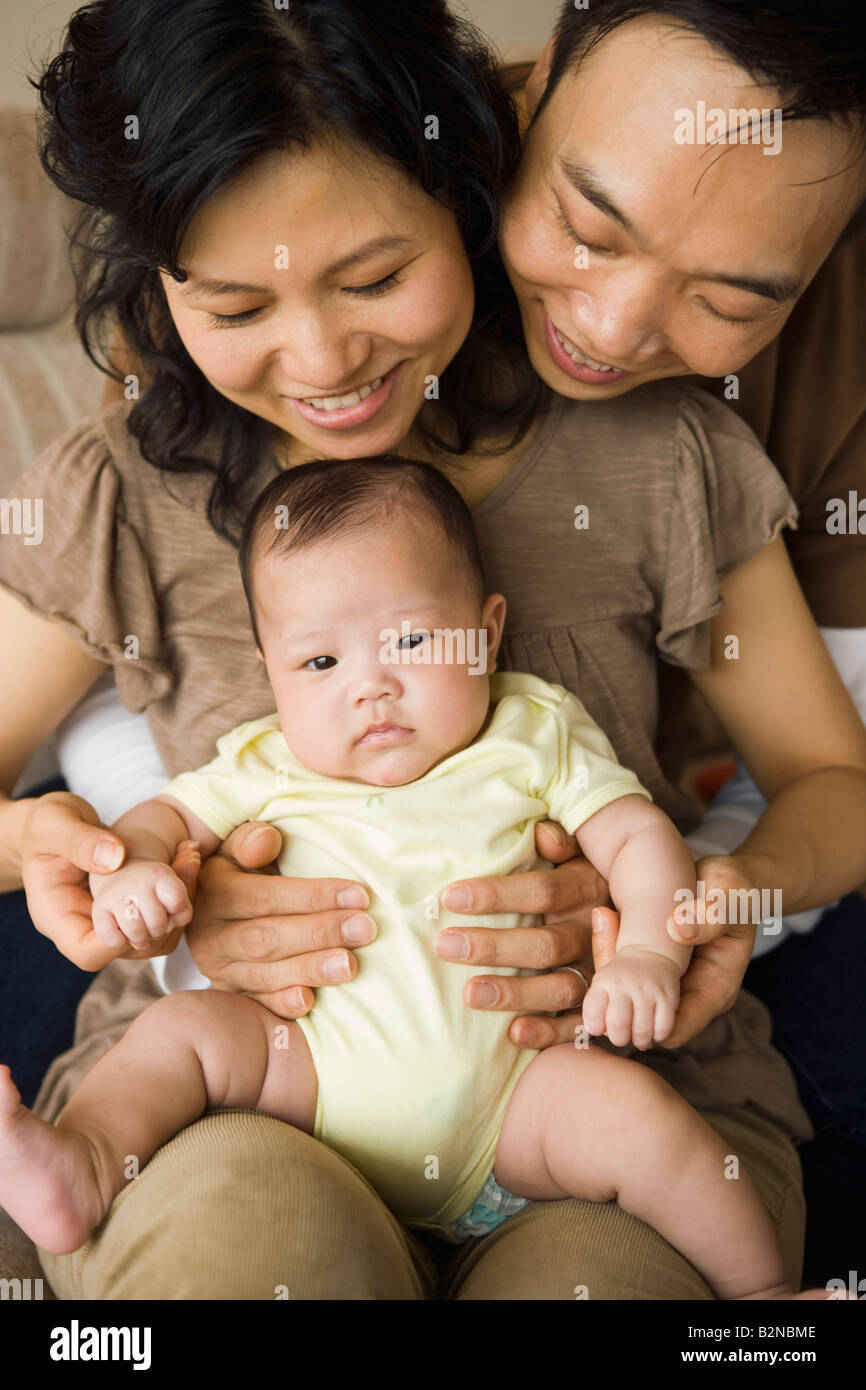 Chinese father smiling baby daughter hi-res stock photography and ...