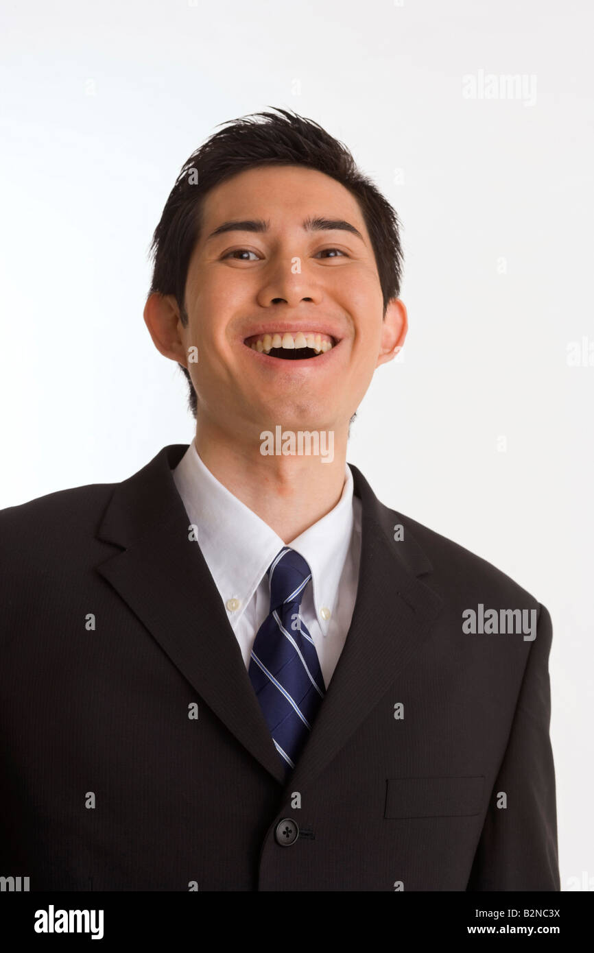 Portrait of a businessman smiling Stock Photo - Alamy