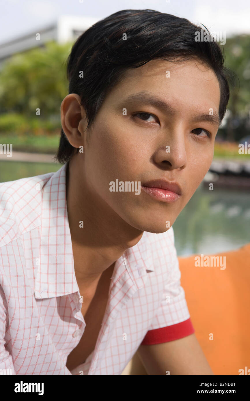 Portrait of a young man, Singapore Stock Photo - Alamy
