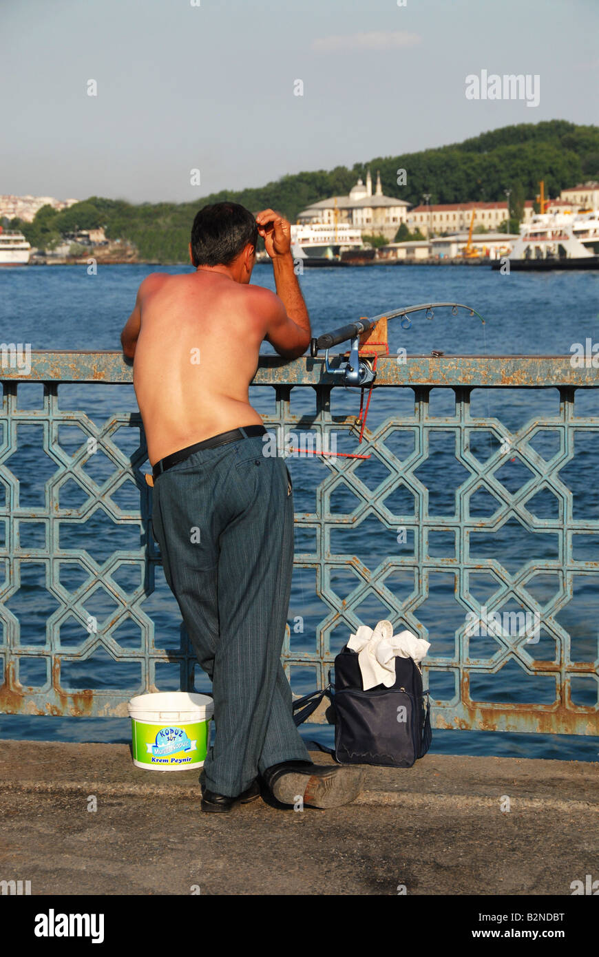 Man fishing from bridge hi-res stock photography and images - Alamy
