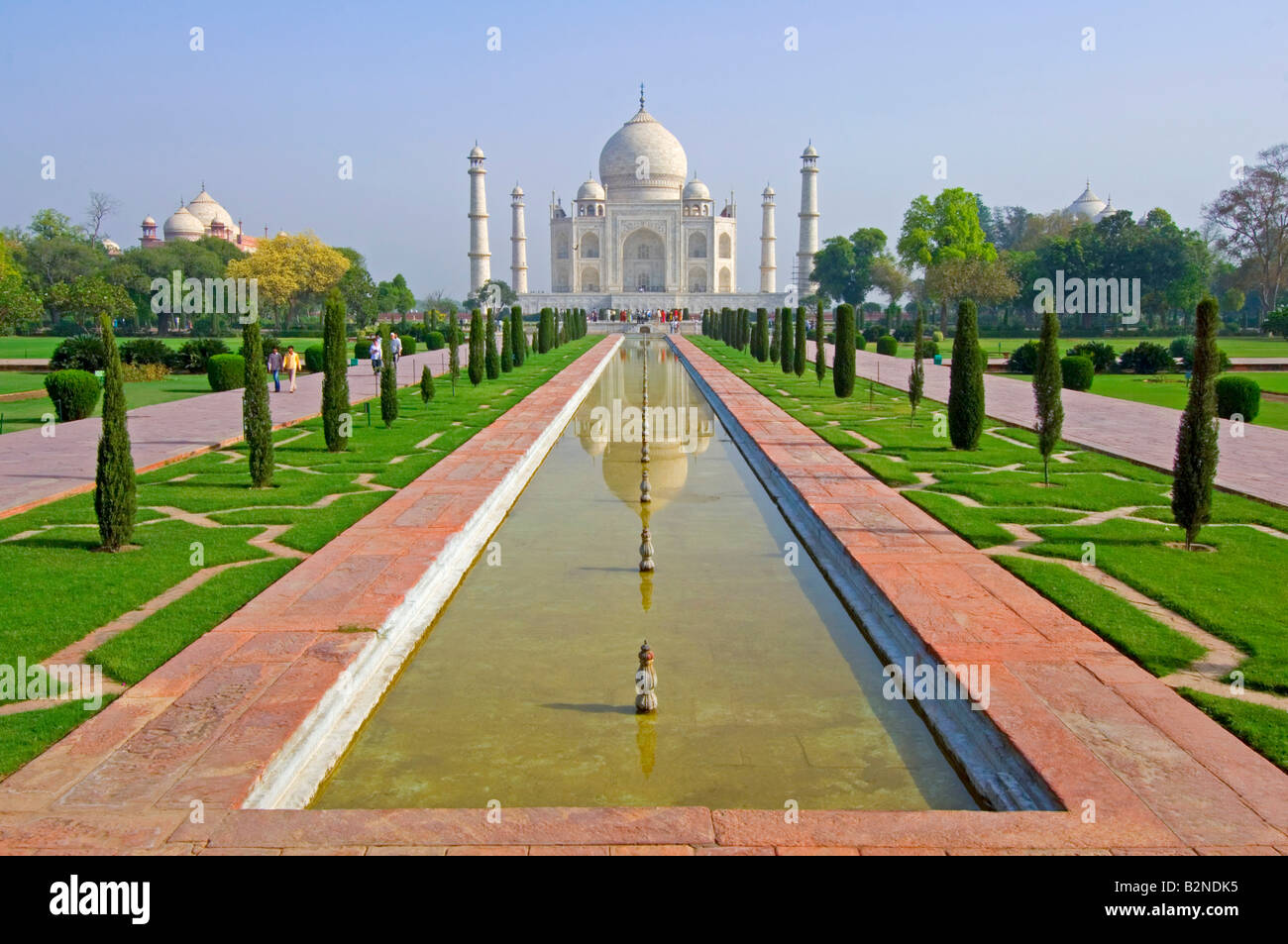 A classic wide angle view of the Taj Mahal reflected in the Lotus Pool ...