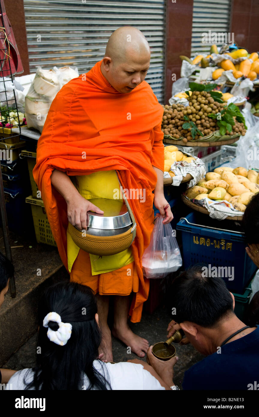 Buddhist monks blessing the people Stock Photo - Alamy