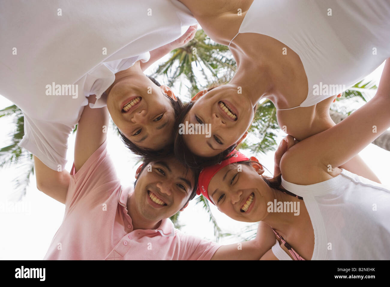 Two women huddle hi-res stock photography and images - Alamy