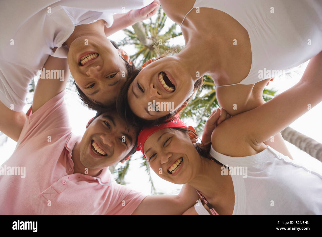 Two women huddle hi-res stock photography and images - Alamy