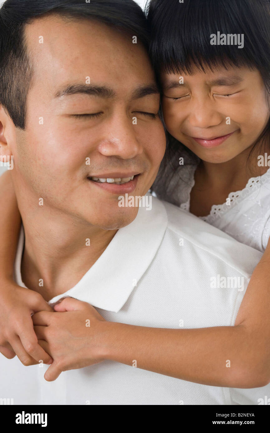 Two girls sitting behind hi-res stock photography and images - Alamy
