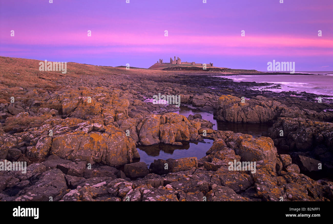 Dunstanburgh Castle on the Northumberland coast of England UK Stock ...